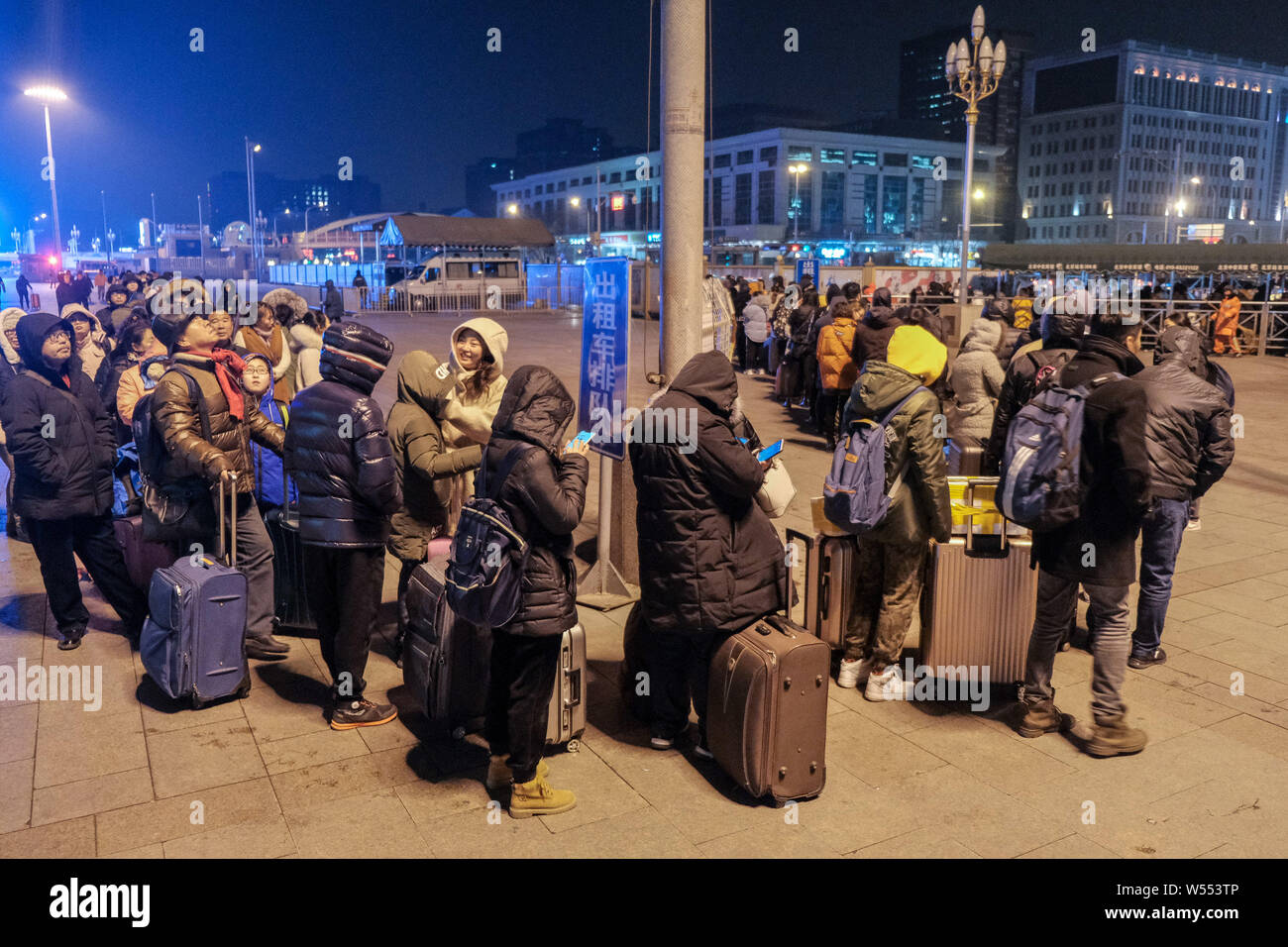 Chinese passengers who return to work from the Chinese Lunar New Year ...