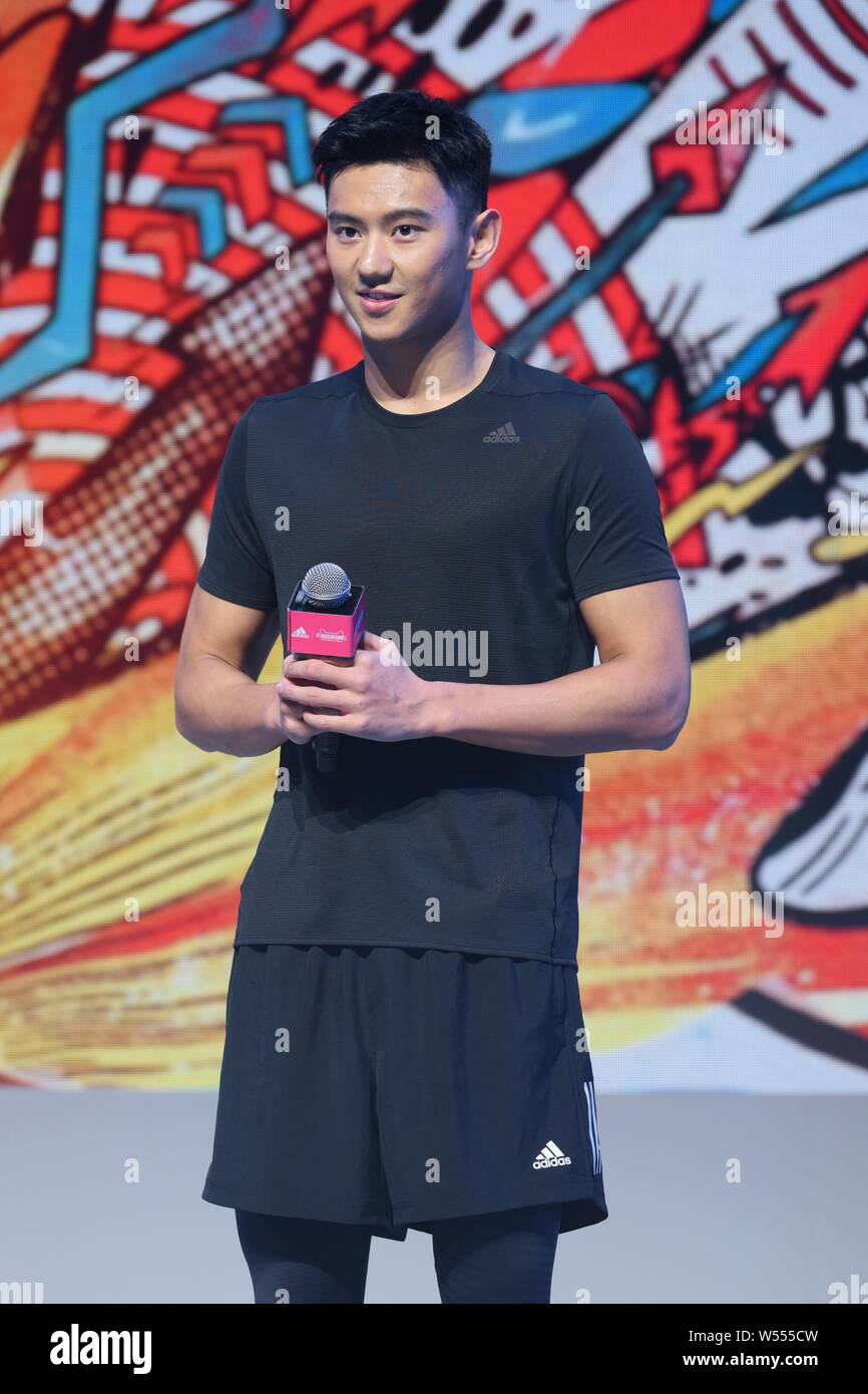 Chinese world swimming champion Ning Zetao attends a promotional event ...