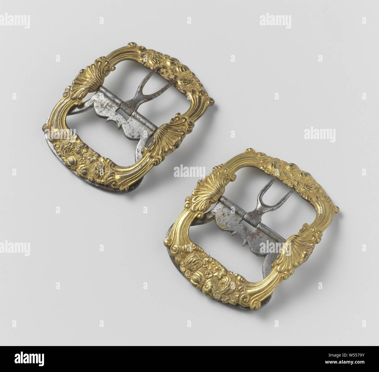 Gold-plated shoe buckle of copper (?), Embellished with shell and fruit ...