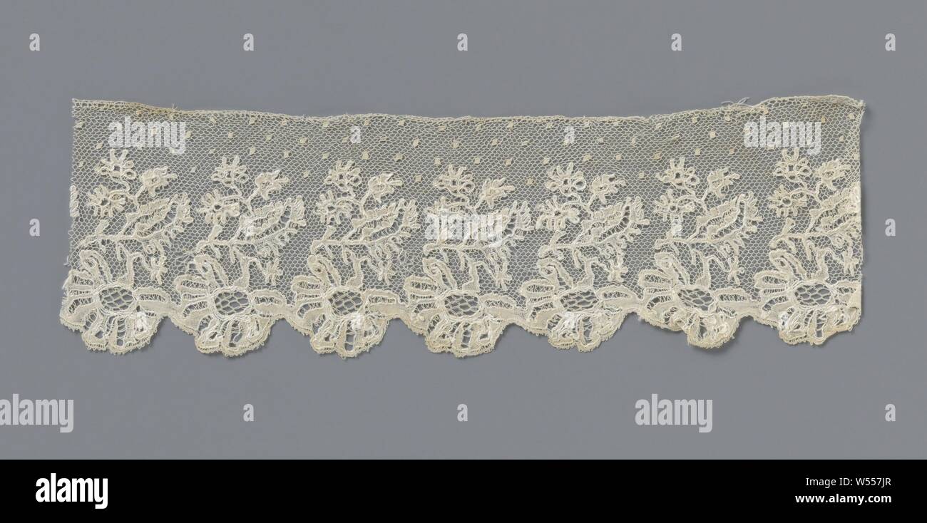 Strip of bobbin lace with scalloped edge of daisies, Strip of natural ...