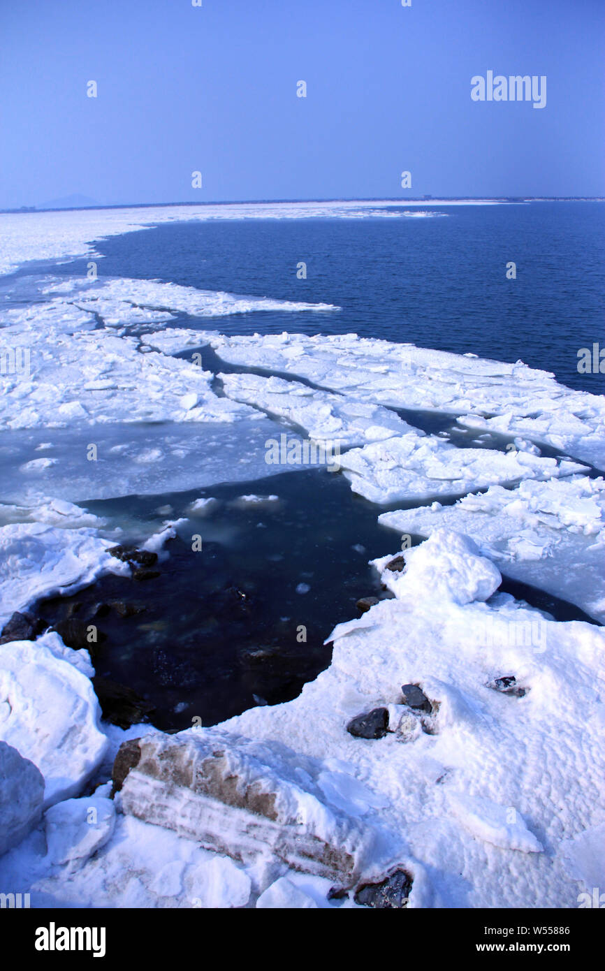 Landscape of the thick sea ice on the frozen sea surface at Bohai Sea ...