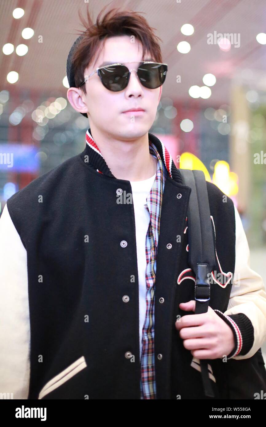 Chinese actor Wu Lei arrives at the Beijing Capital International ...