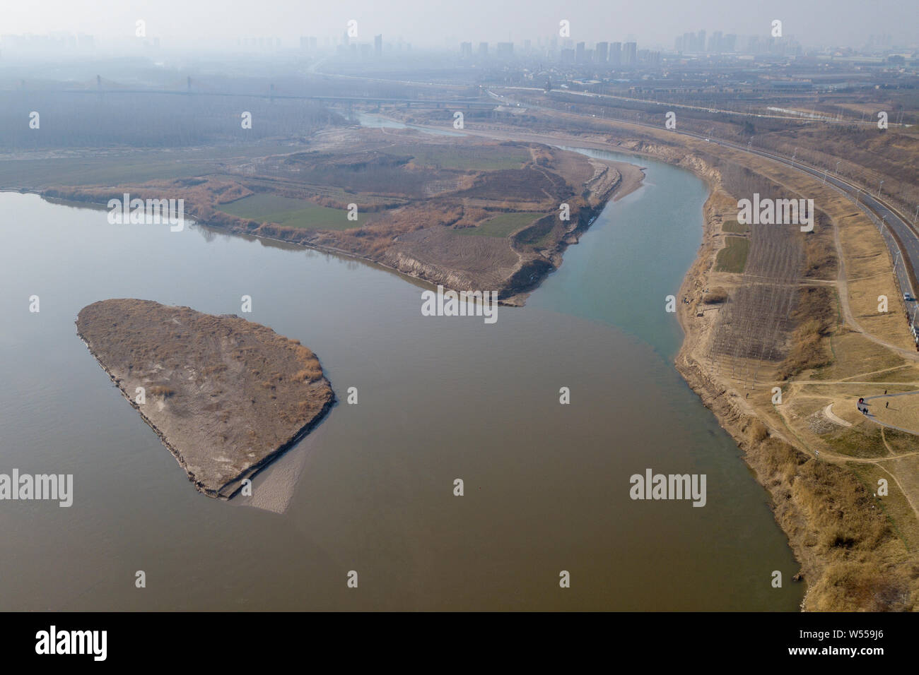 The clean Jing River meets the sandy Wei River in Xi'an city, northwest ...