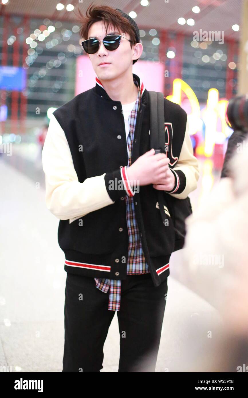 Chinese actor Wu Lei arrives at the Beijing Capital International ...