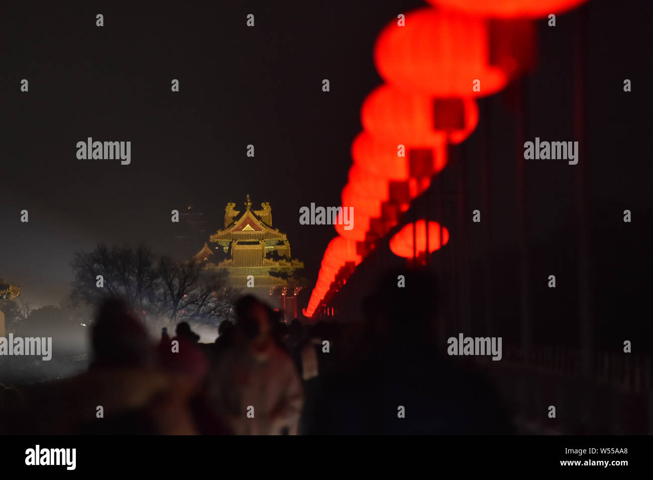 The Palace Museum, also known as the Forbidden City, is illuminated by ...
