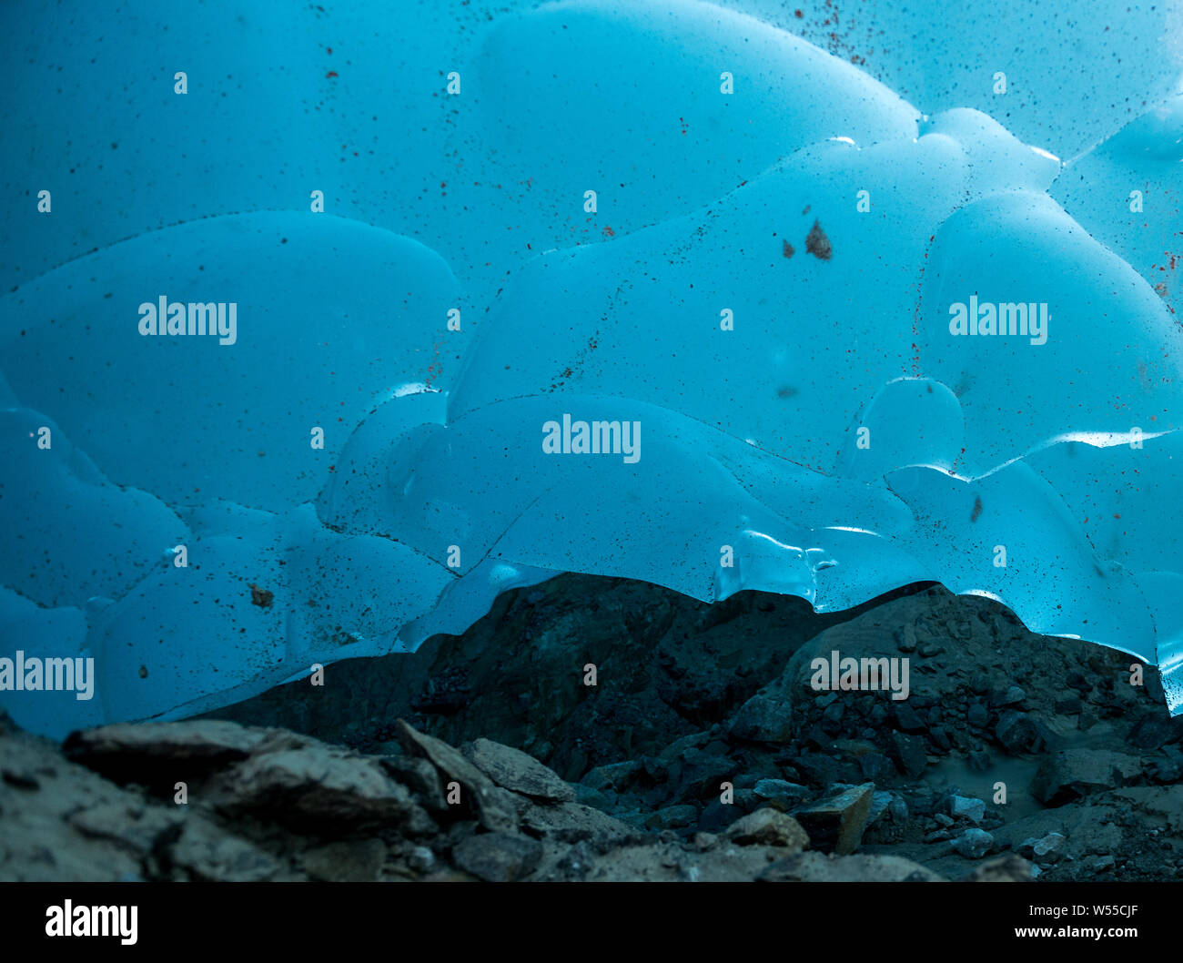 below the glacier in a ice cave Stock Photo - Alamy