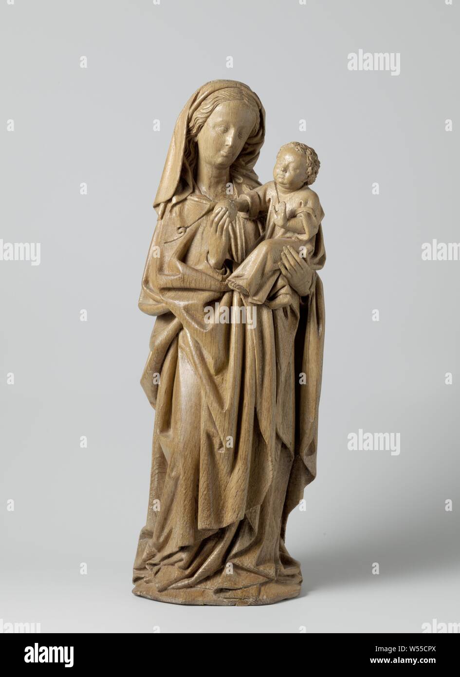 Maria with child, Maria with a child in her left arm. In her right hand ...