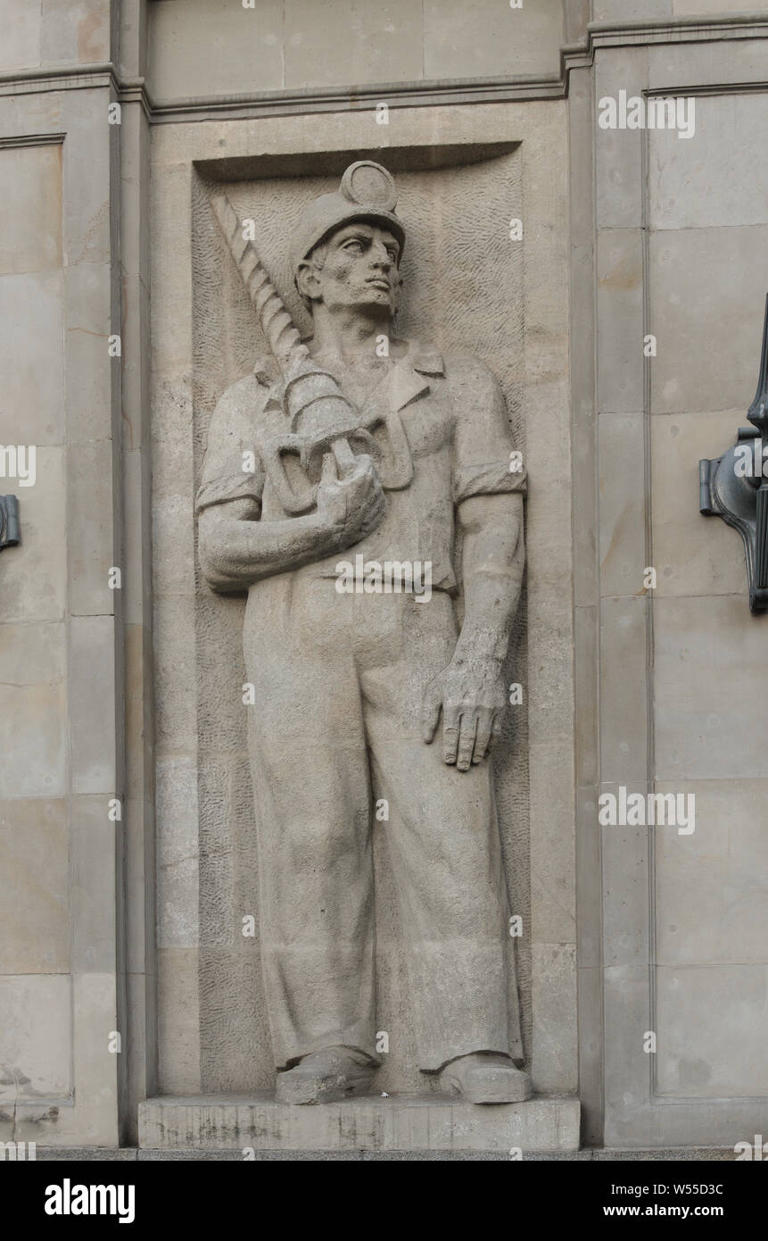 Bas relief of workers at Constitution square Stock Photo - Alamy