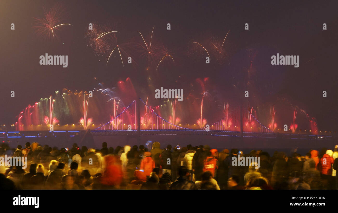 Fireworks explode over the sky to celebrate the Lantern Festival at the ...