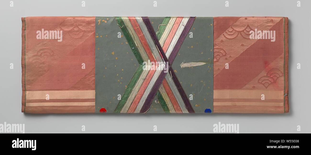 Shelf of paper on which silk fabric with pattern of diagonal webs ...