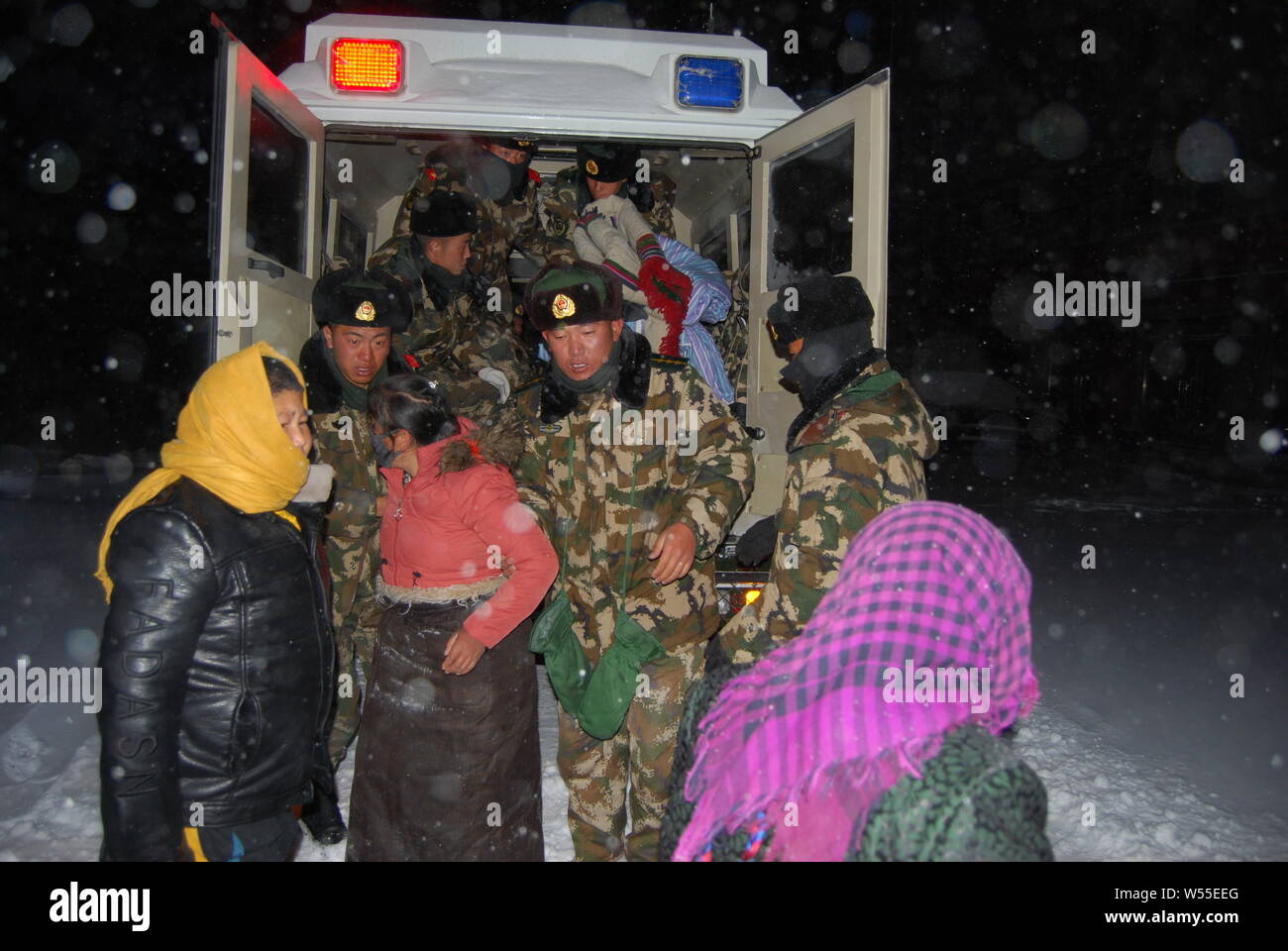 Chinese paramilitary policemen evacuate students and their parents ...