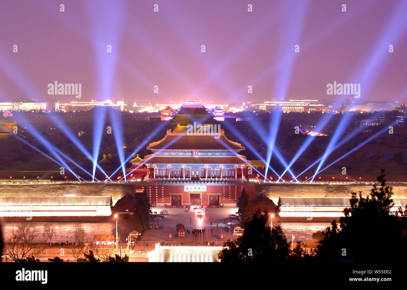 The Palace Museum, also known as the Forbidden City, is illuminated by ...