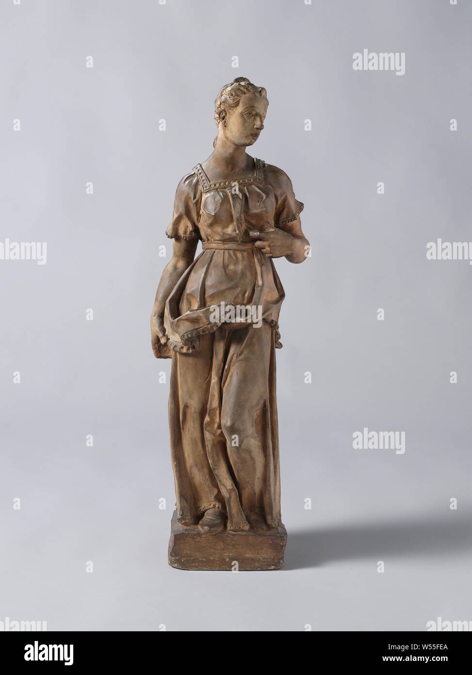 Standing woman, Image of terracotta, depicting a young woman in ...