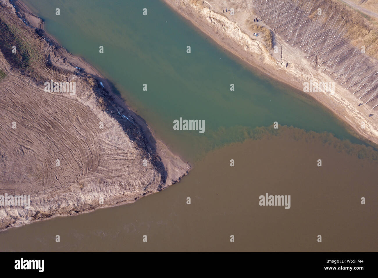 The clean Jing River meets the sandy Wei River in Xi'an city, northwest ...