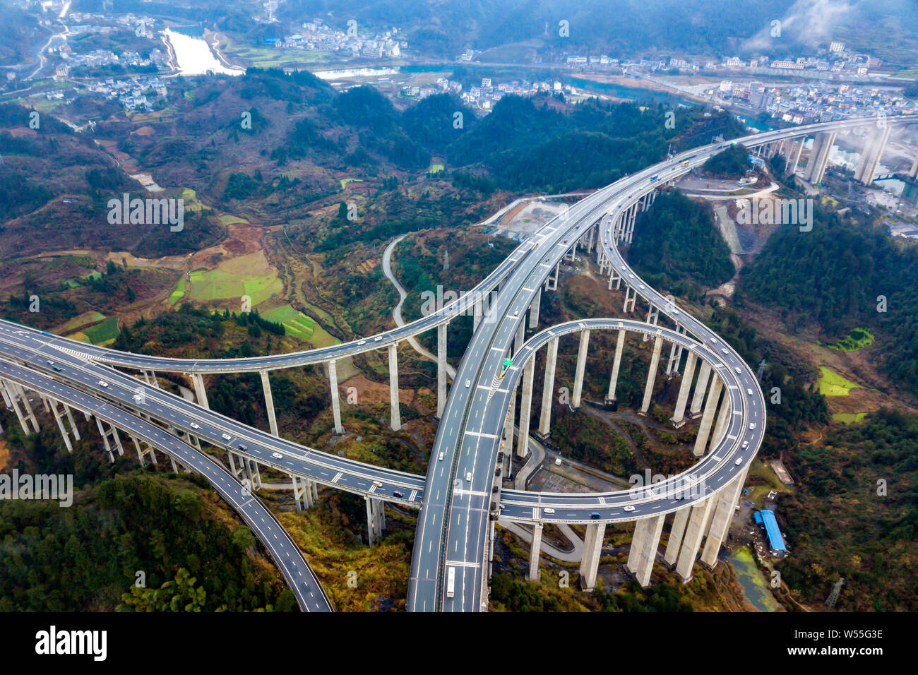 Cars move slowly on the Aizhai Bridge, a suspension bridge on the ...