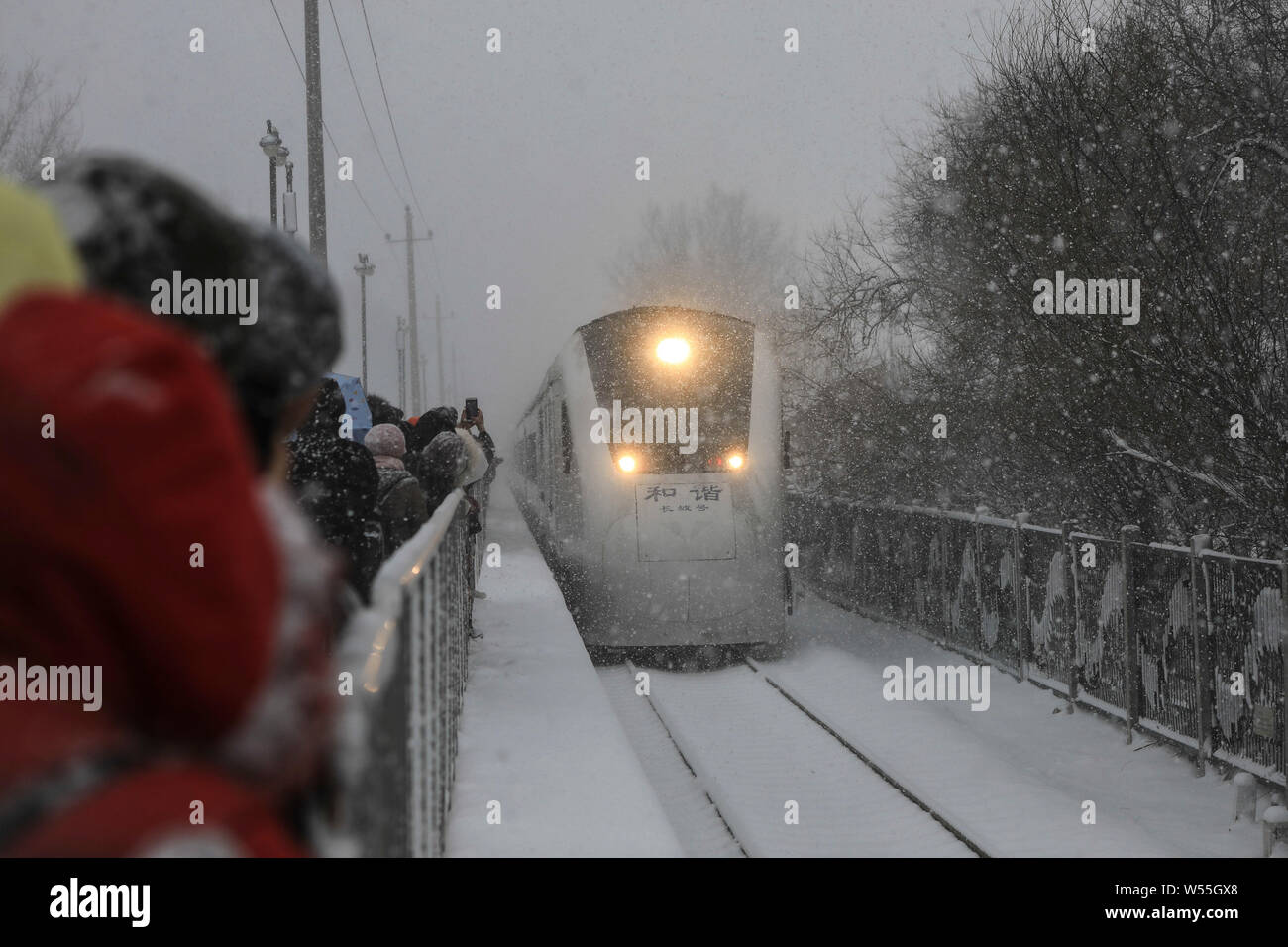 Chinese tourists take a S2 Maglev subway train to visit the Badaling ...