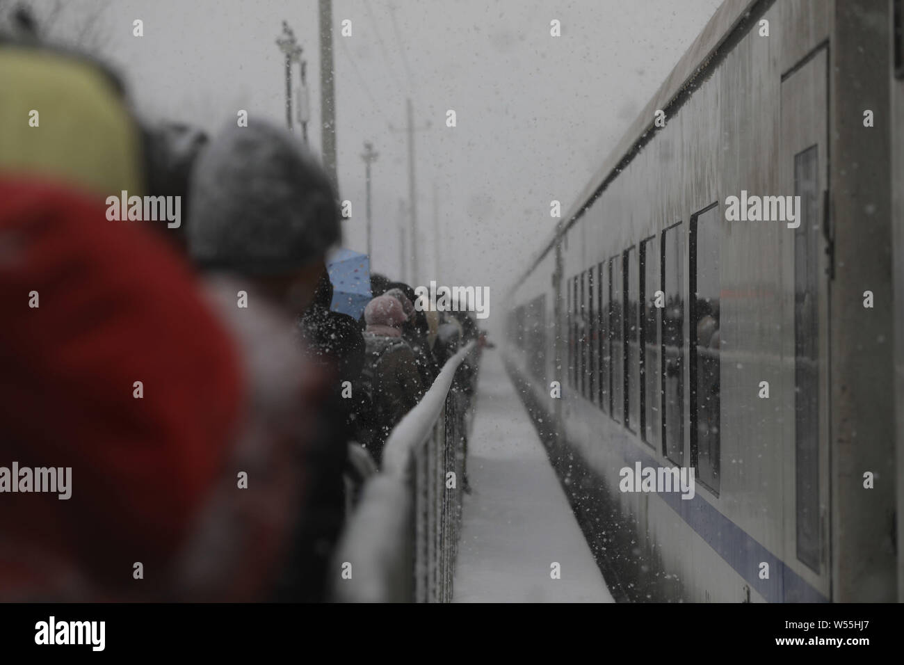 Chinese tourists take a S2 Maglev subway train to visit the Badaling ...