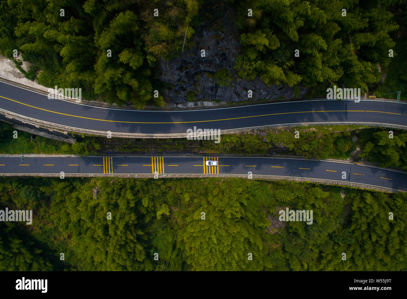 An aerial view of the zigzag cliff road, which is a scene in the ...