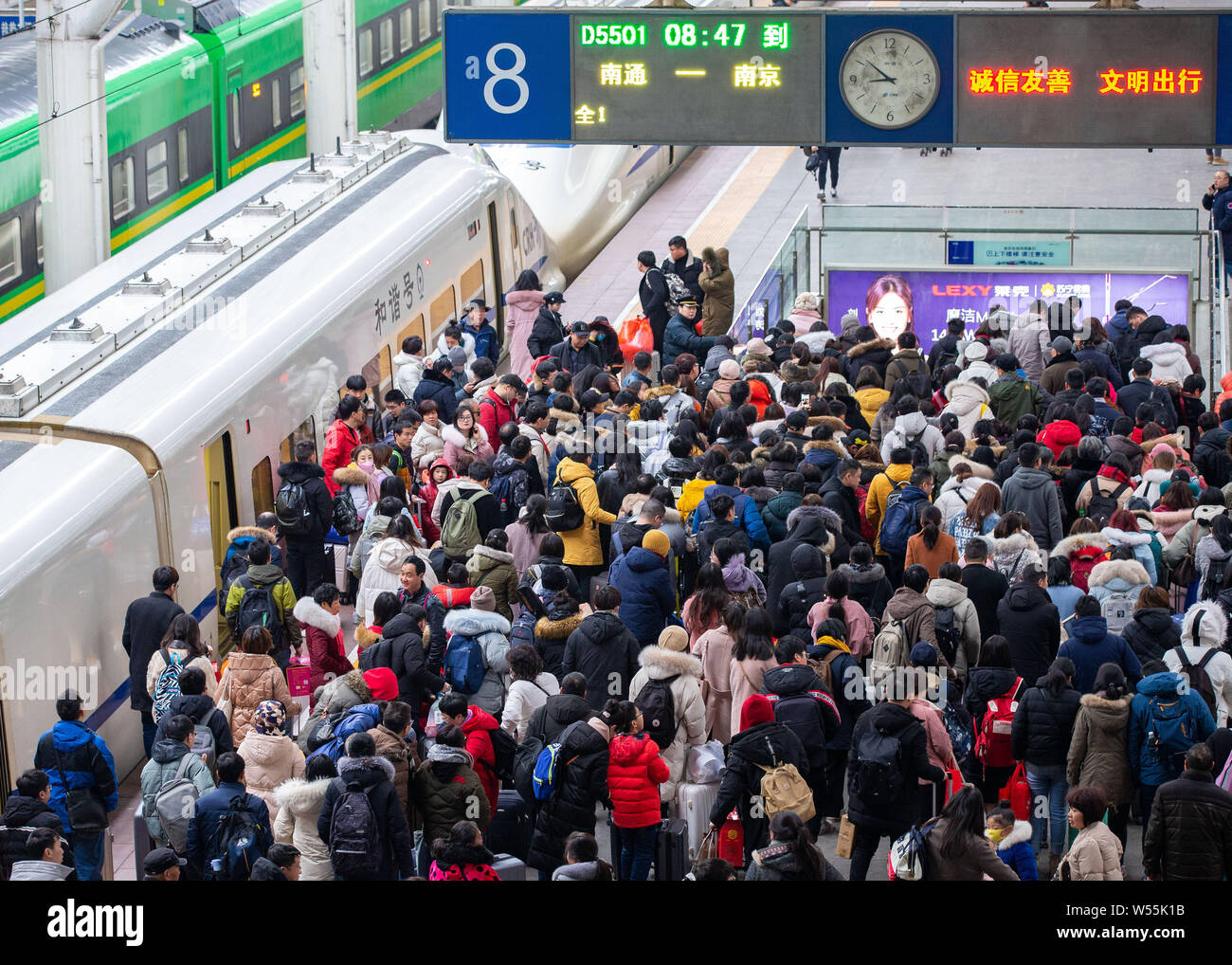 Chinese passengers who return to work from the Chinese Lunar New Year ...