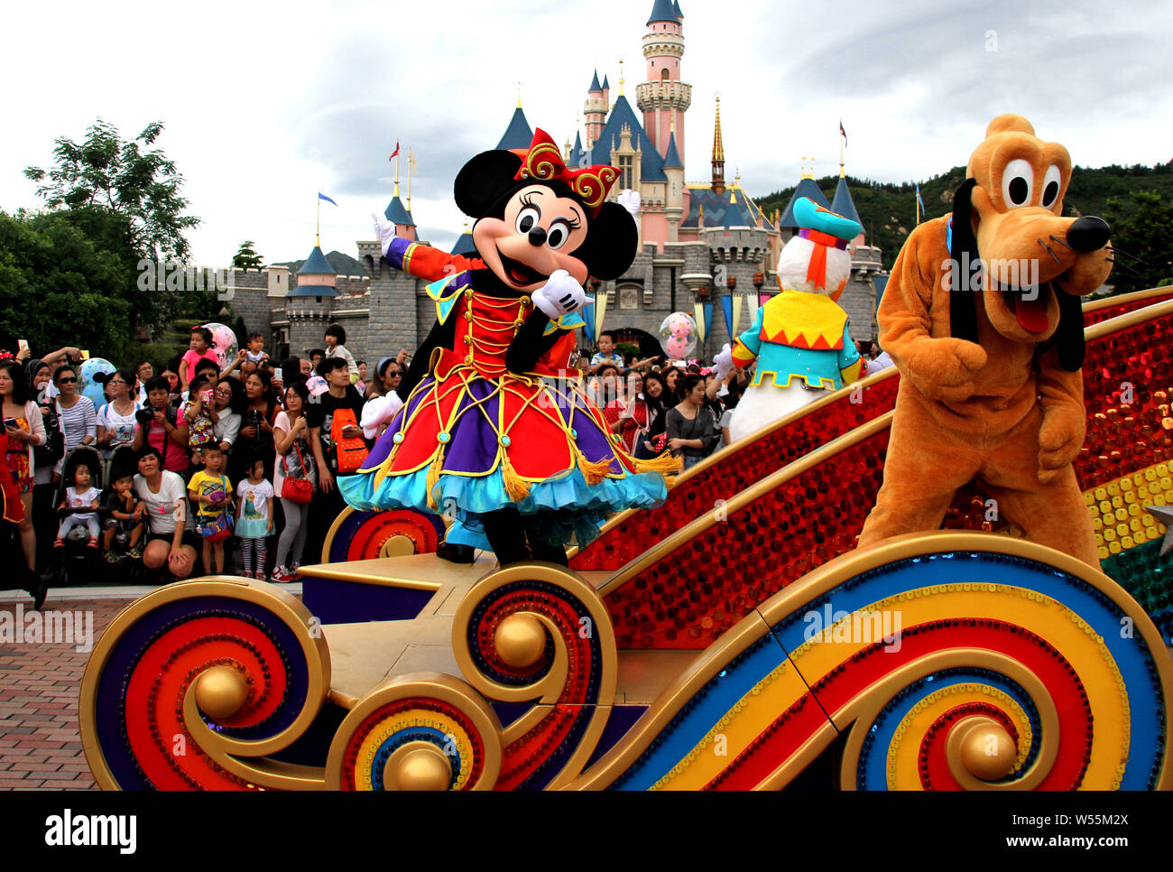 --FILE--An entertainer dressed in the costume of Minnie Mouse performs ...