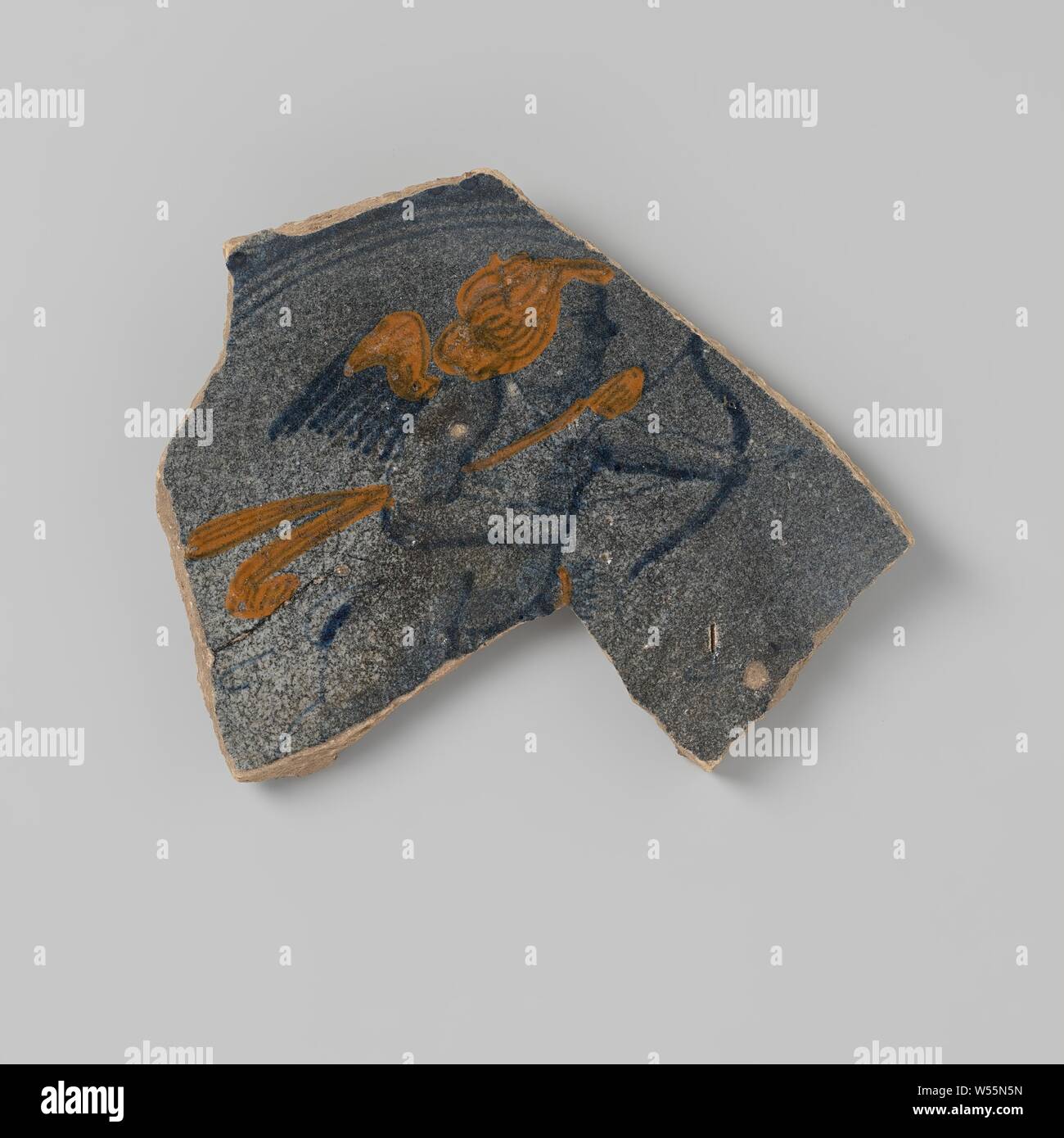 Pottery shrapnel with a drawing of an amor in blue and yellow ...