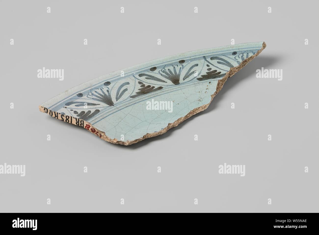 Pottery saucer of earthenware, with lead glaze on the underside and ...