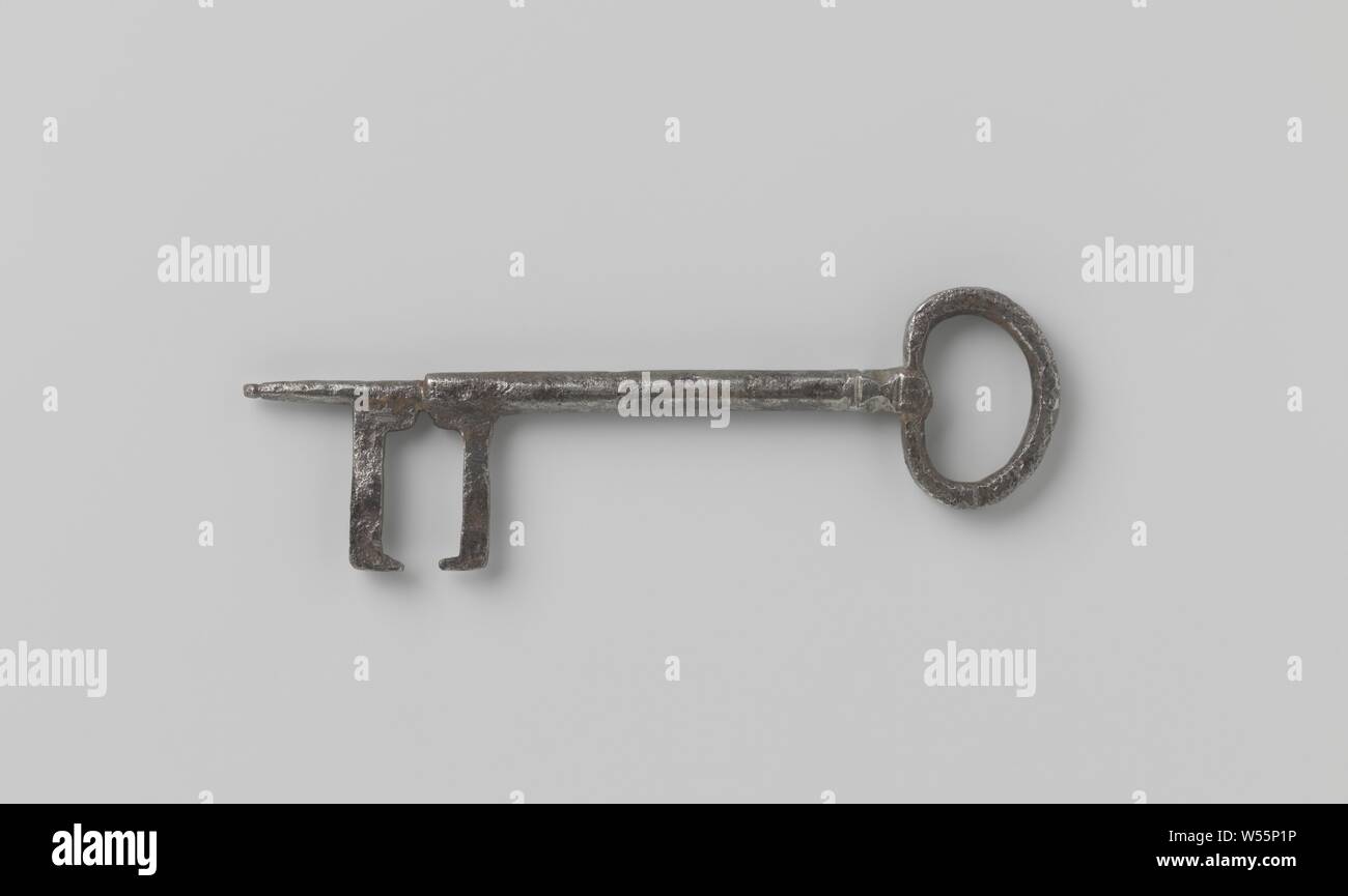 Key with bean-shaped eye and shaft that runs out of a double beard. The ...