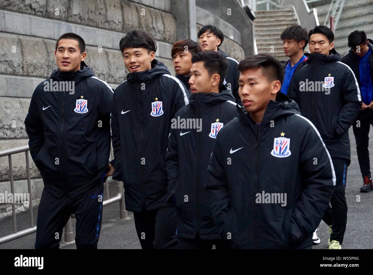 Players of Shanghai Greenland Shenhua attend a launch ceremony to gear ...