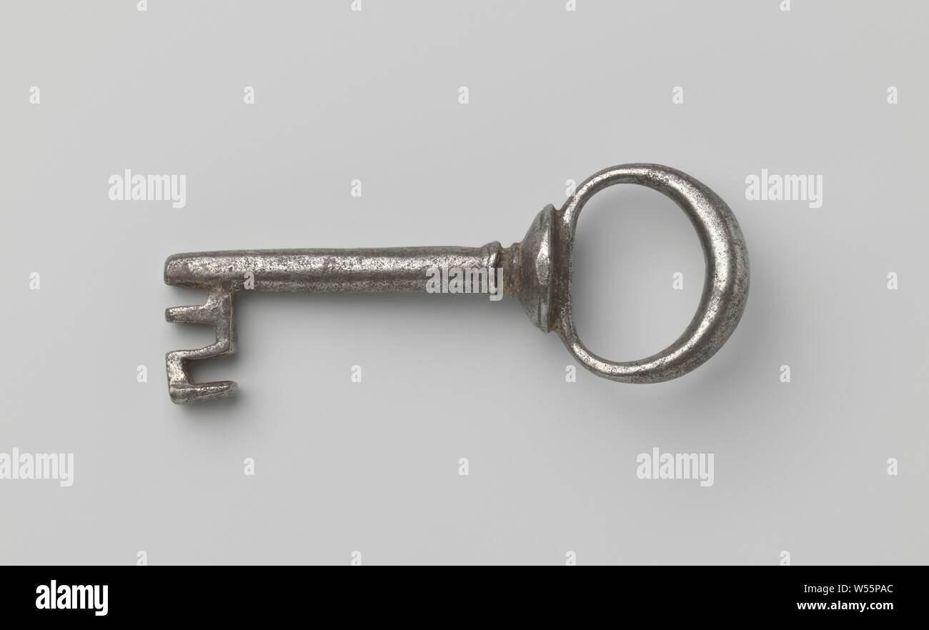 Key, Key with a ring-shaped eye widening above. This rests on the flat ...
