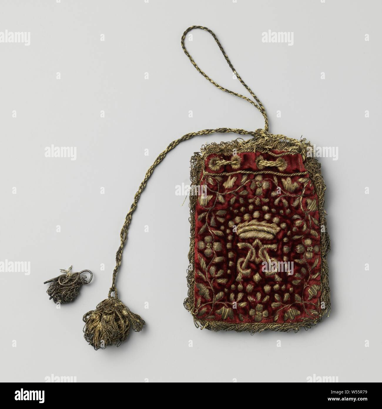 Pouch of wine-red velvet, embroidered in gold thread with flower ...