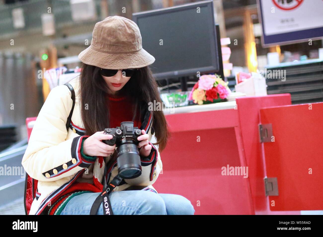 Chinese actress Ni Ni arrives at the Beijing Capital International ...