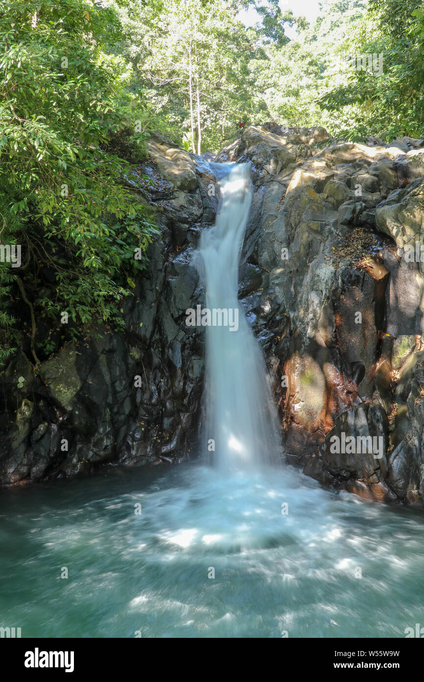 Kroya waterfall in Sambangan mountain area on Bali island. The pools ...