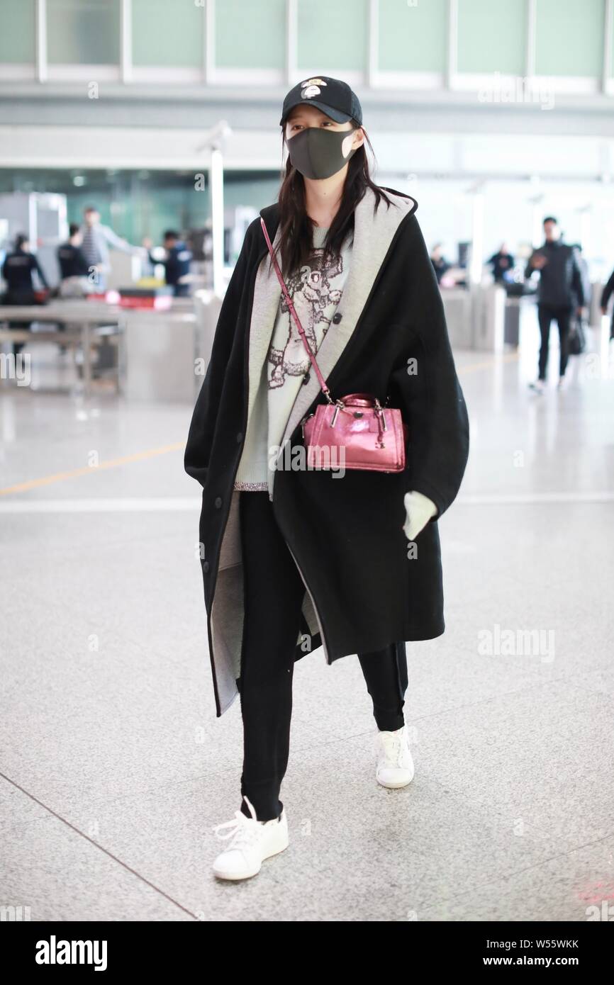 Chinese actress Guan Xiaotong arrives at the Beijing Capital ...