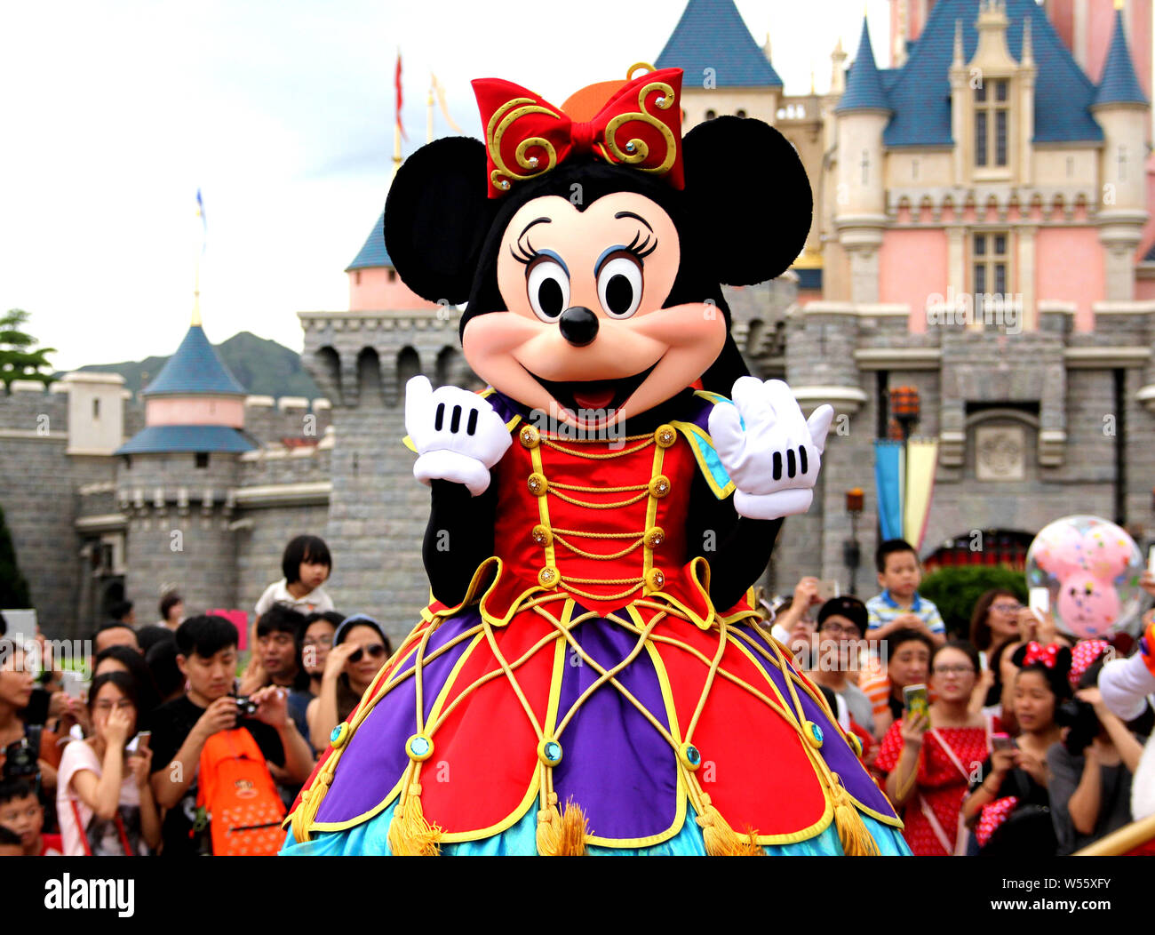 --FILE--An entertainer dressed in the costume of Minnie Mouse performs ...