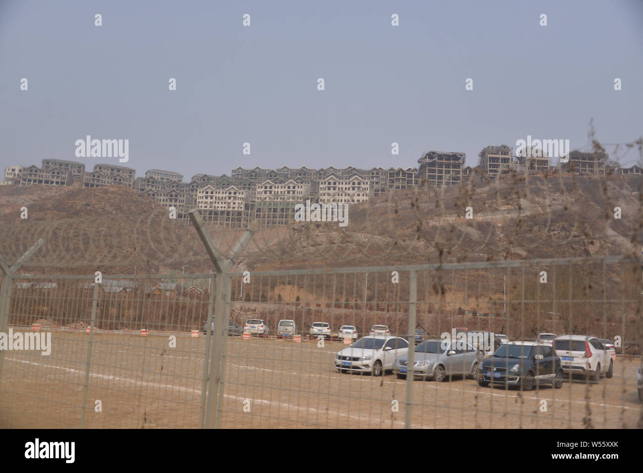 An aerial view of the mountain land and villas under construction in ...