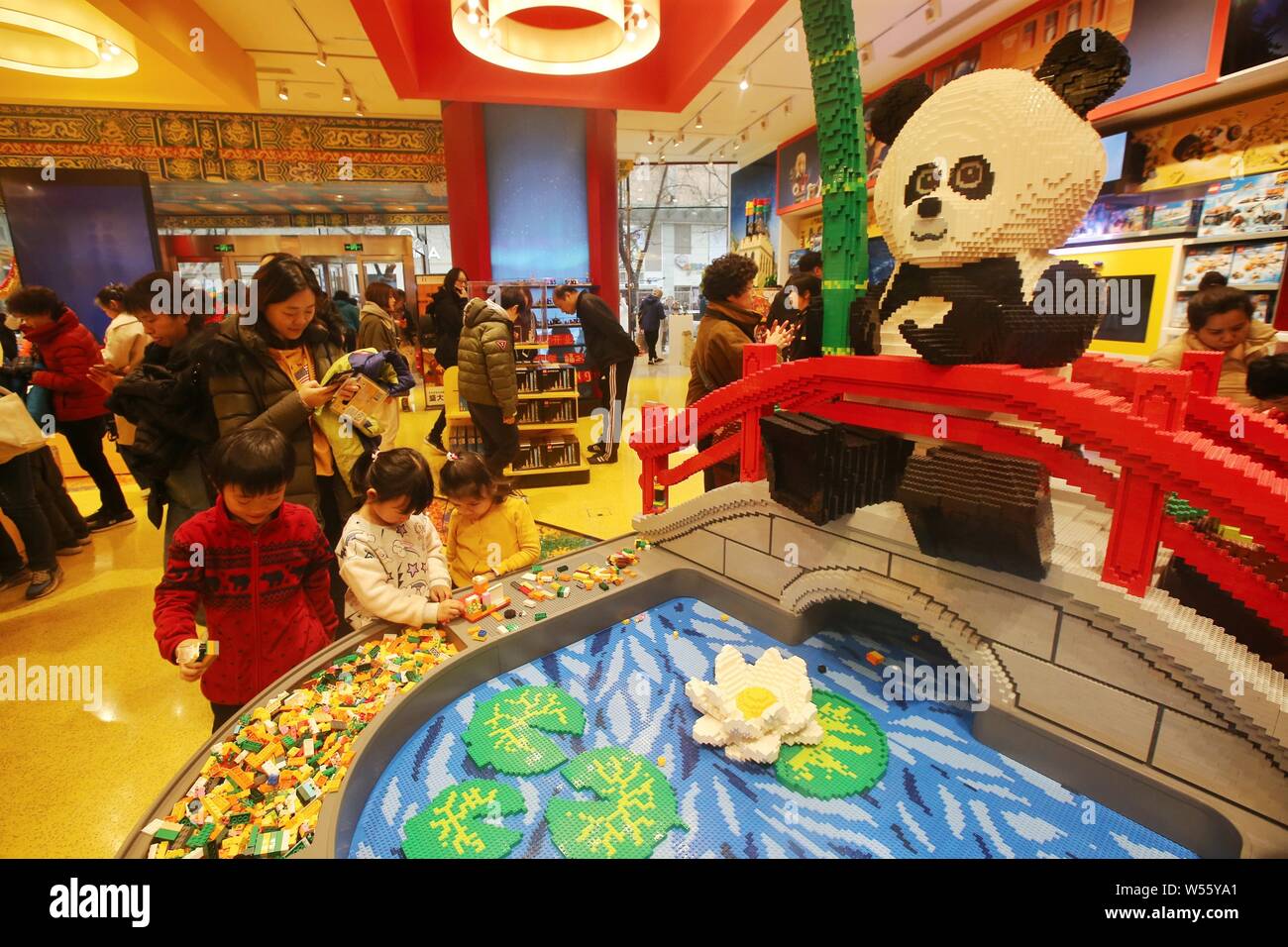 Customers visit the first Beijing flagship store of Danish toy giant ...