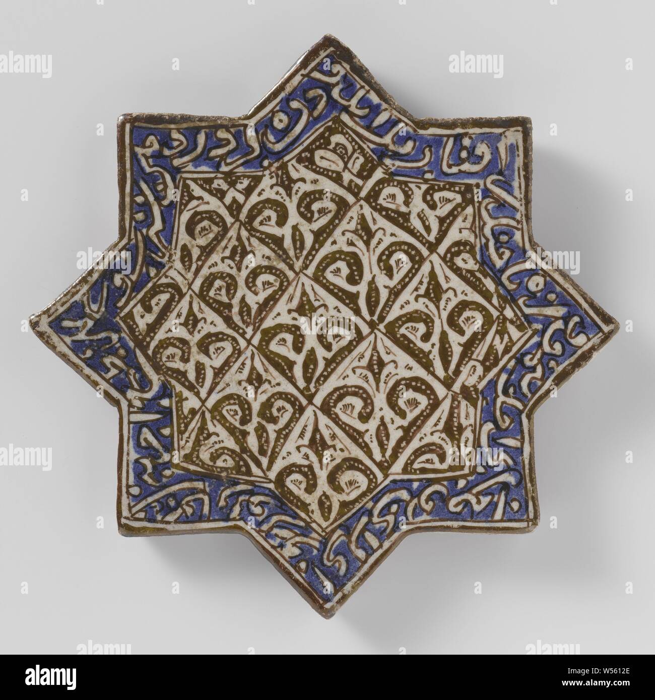 Star-shaped tile with stylized plants and pseudo-inscription, star ...
