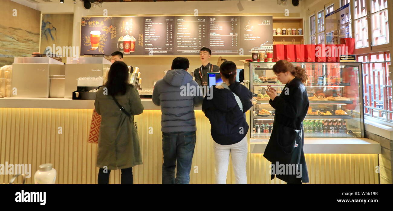 View of the Corner Tower Cafe near the Palace Museum, also known as the ...