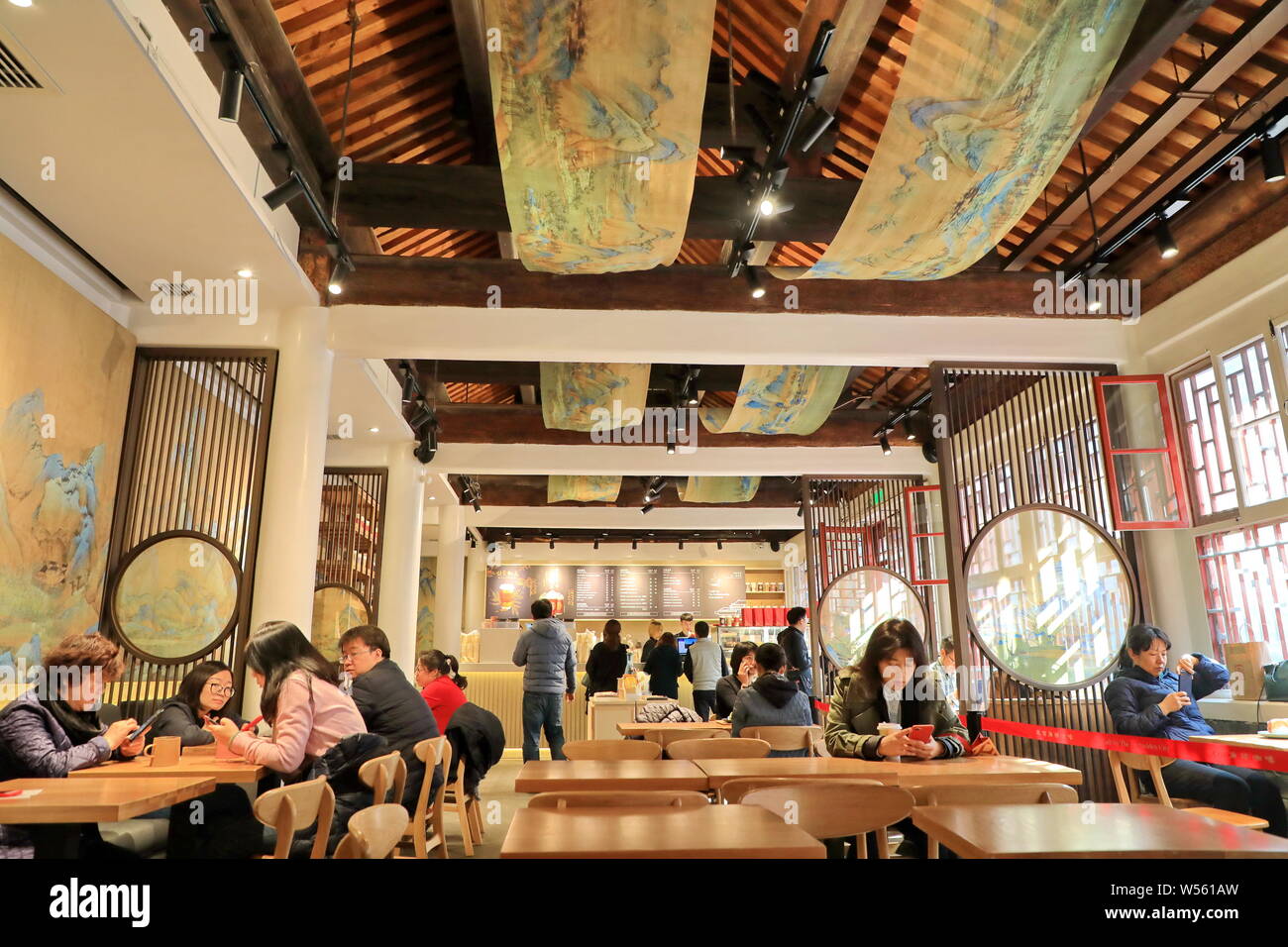 Chinese customers enjoy coffee at the Corner Tower Cafe near the Palace ...
