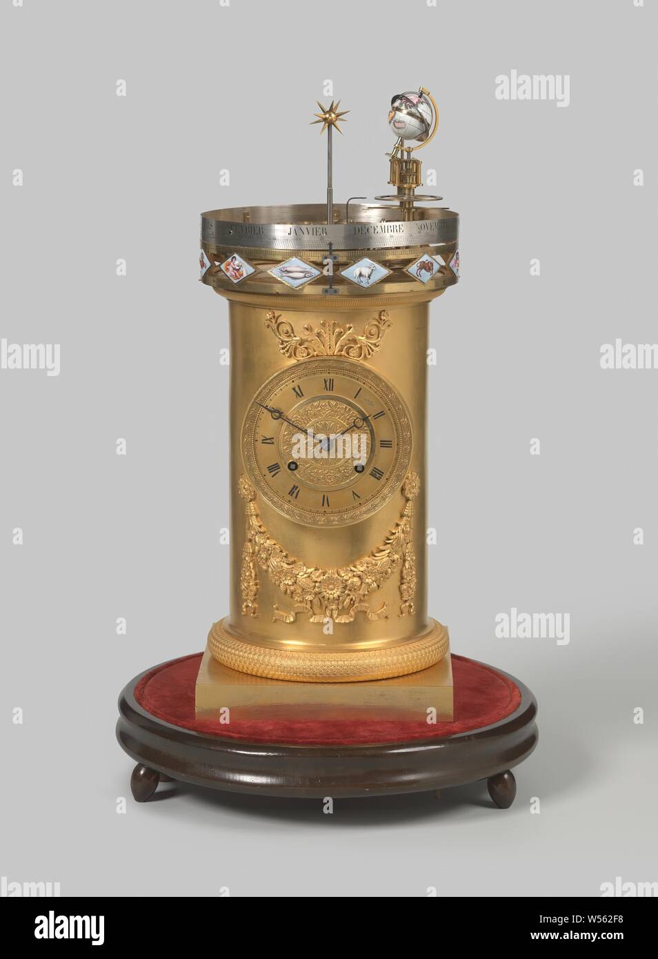 Planetarium clock in the shape of a tower on a square base with ...