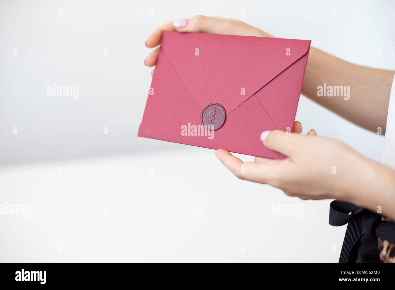 Woman building house cards hi-res stock photography and images - Alamy