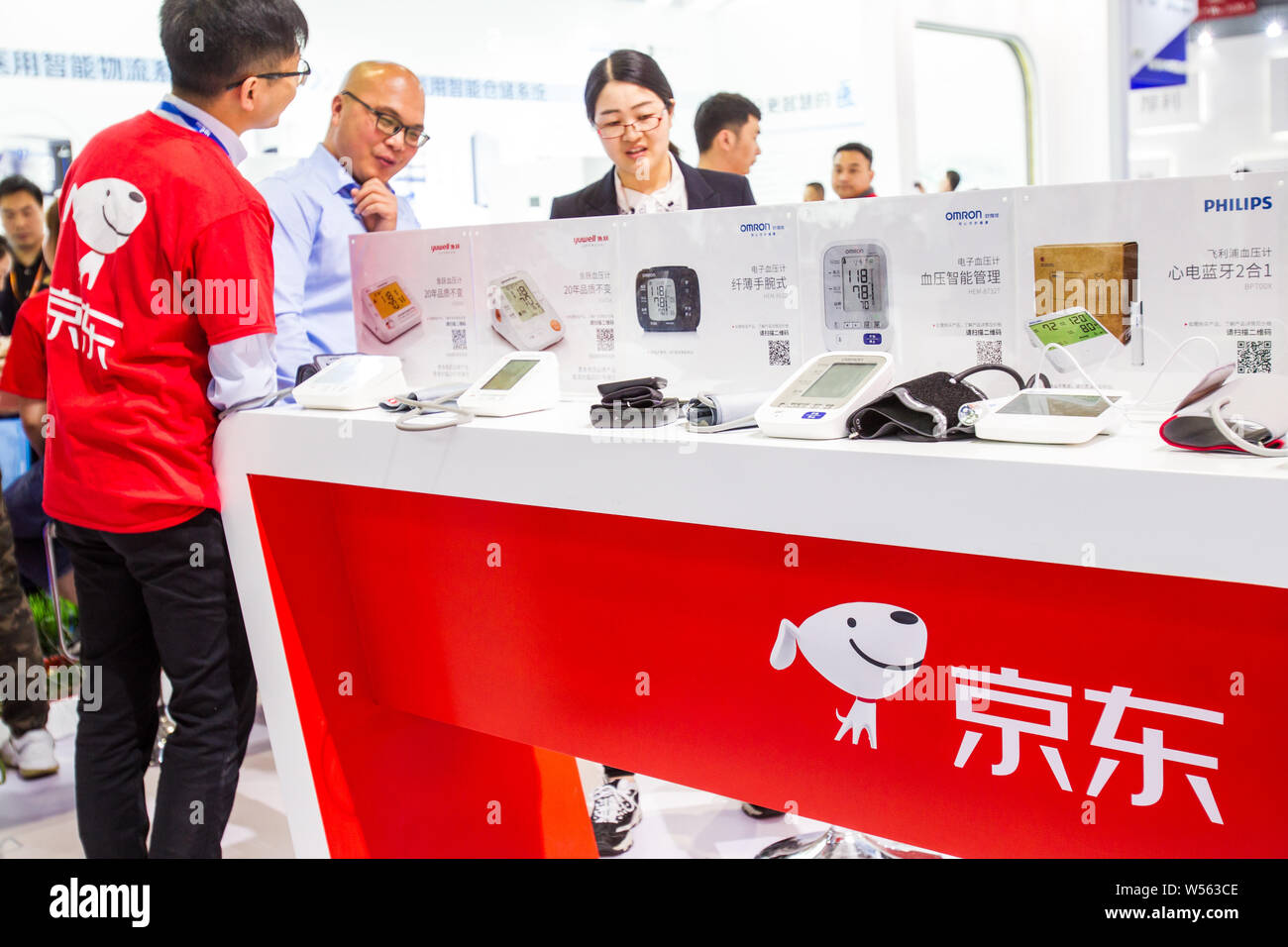 --FILE--People visit the stand of Chinese online retailer JD.com during ...