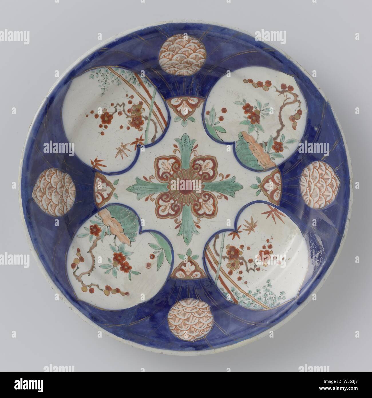 Plate of multicolored painted faience, Plate of faience. Multicolored ...
