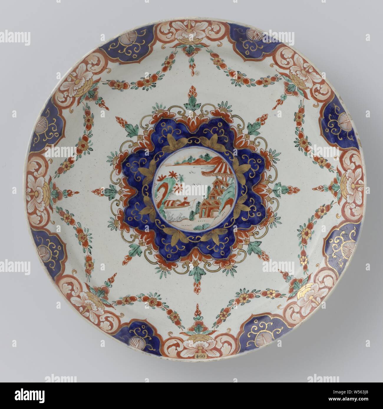 Plate of multicolored painted faience, Plate of faience. Multicolored ...