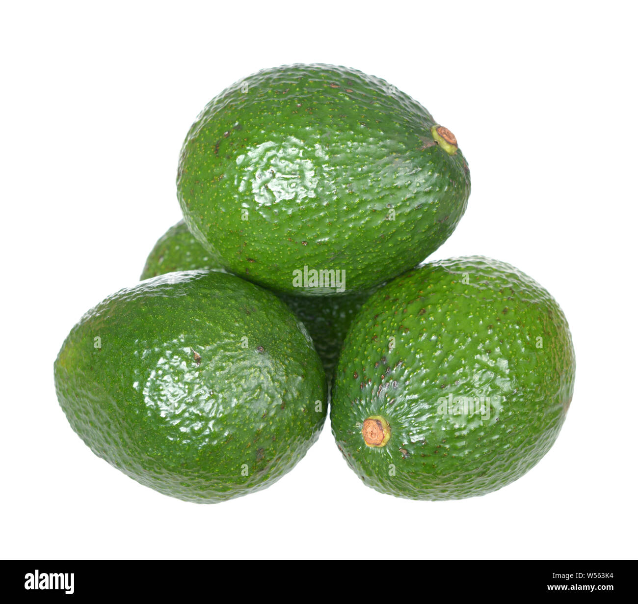 Four avocado isolated on white Stock Photo - Alamy