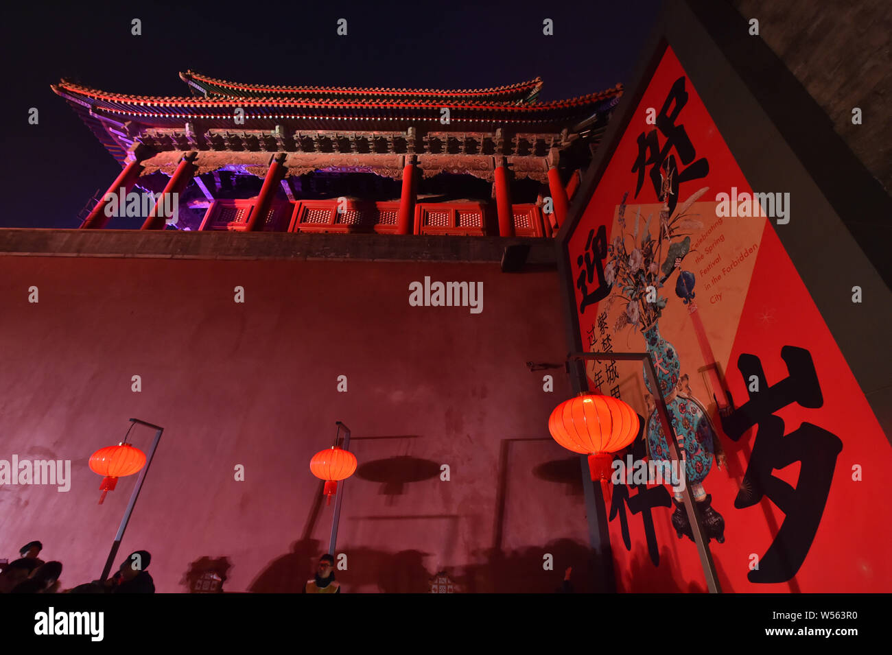 The Palace Museum, also known as the Forbidden City, is illuminated by ...