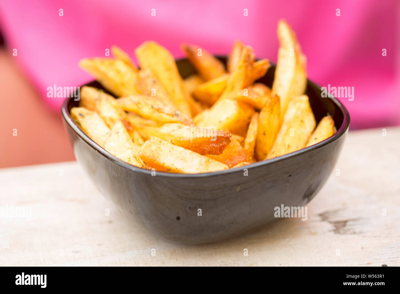 Bowl of potato chips fries with ginger dip Stock Photo - Alamy