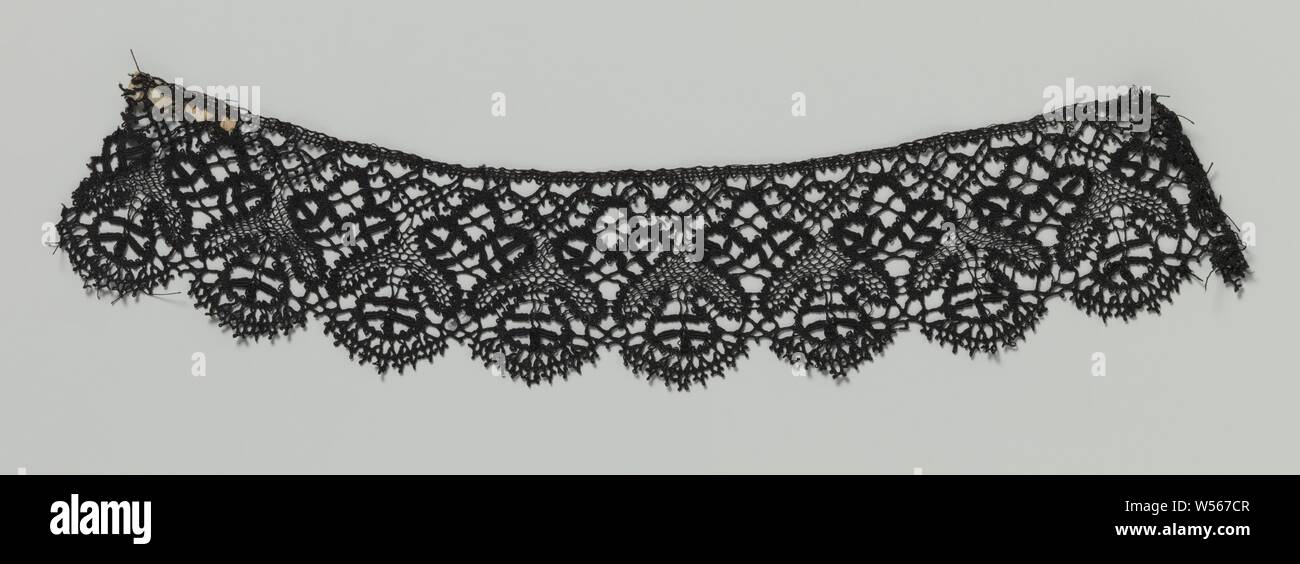Strip of bobbin lace with upright triangular leaf and hanging fan ...