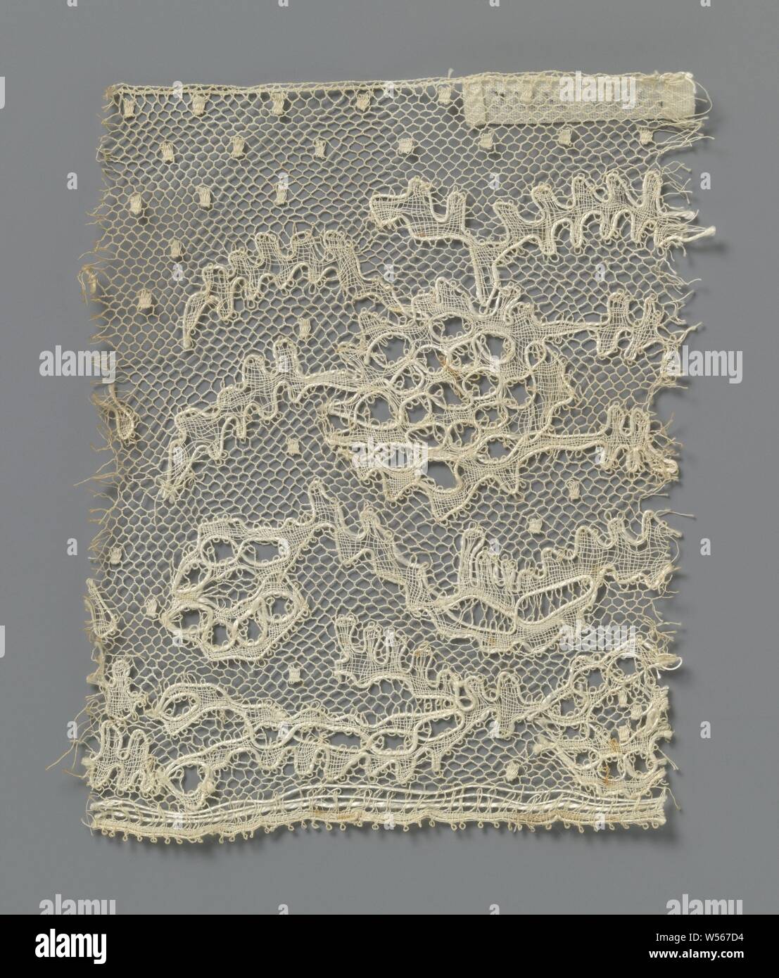 Strip of bobbin lace with capricious round flower, Strip of natural ...