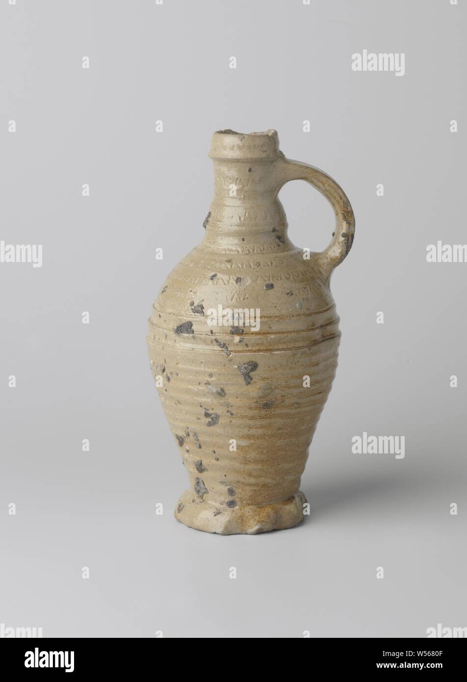 Jug with shivering, Jar of stoneware on a corrugated base with an egg ...